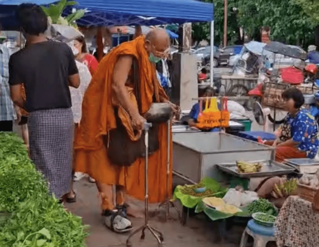 Street Vendor Unmasks Fake Monk Pretending To Be Disabled